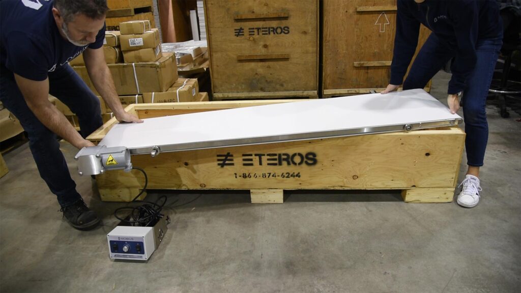 Conveyor Uncrating & Assembly - Mobius Trimmer Canada