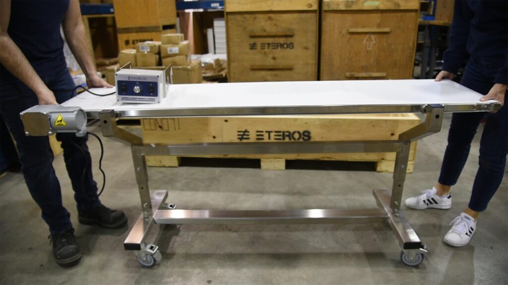 Conveyor Uncrating & Assembly - Mobius Trimmer Canada