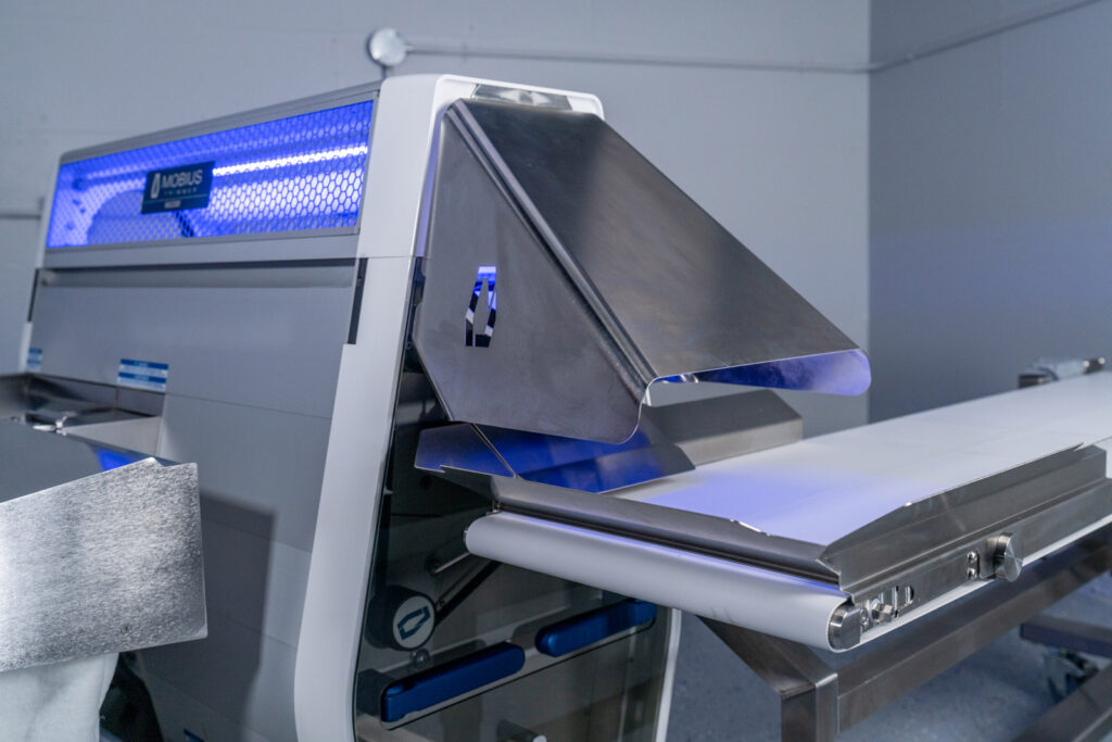 Outfeed Conveyor | Mobius Trimmer