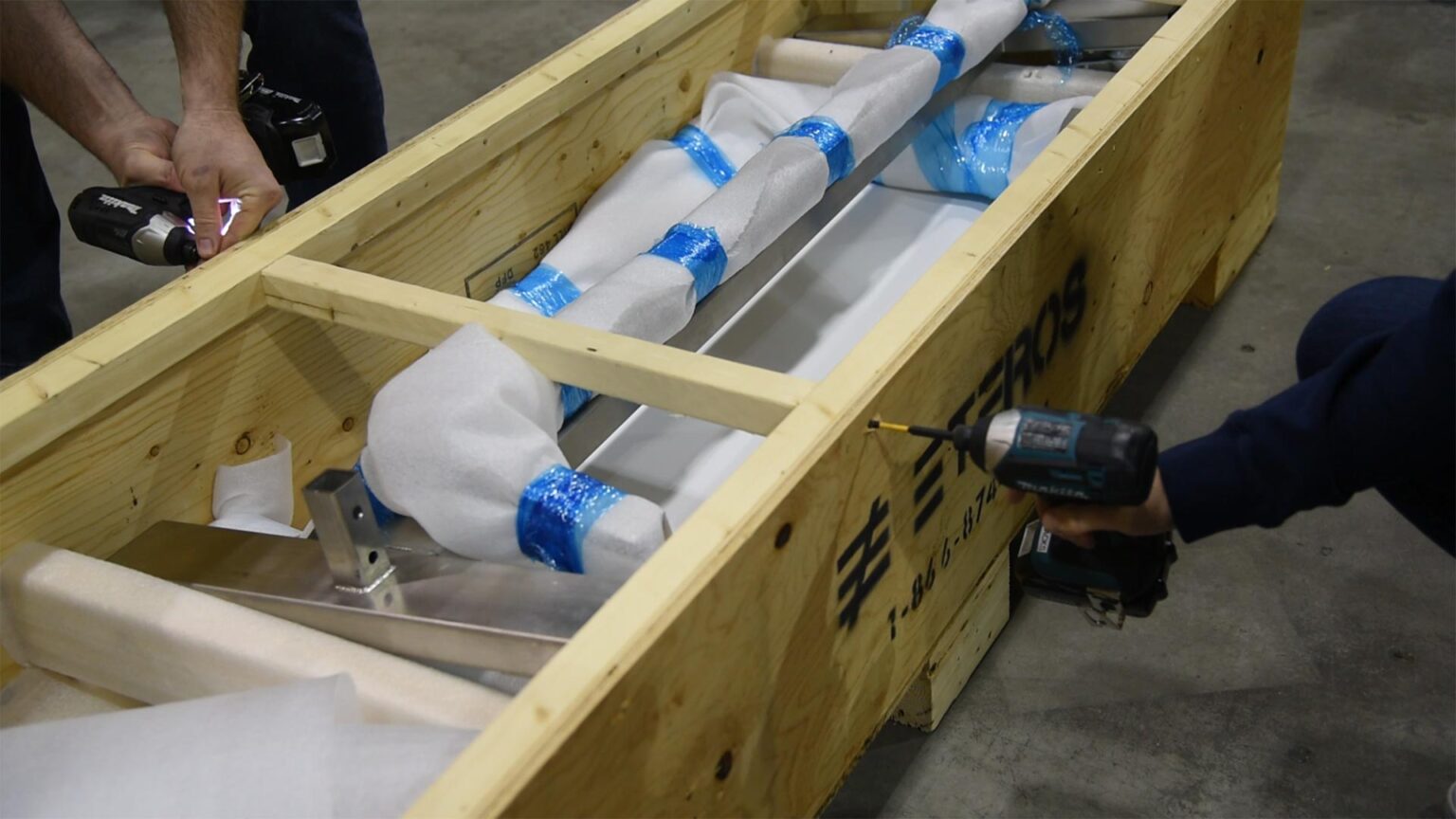 Conveyor Uncrating & Assembly - Mobius Trimmer