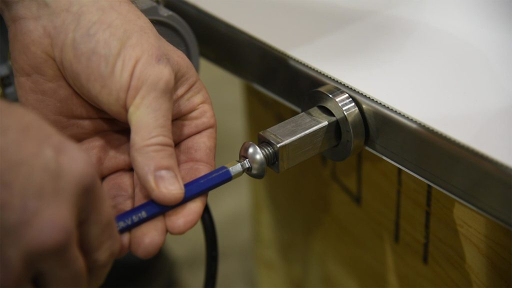 Conveyor Uncrating & Assembly - Mobius Trimmer