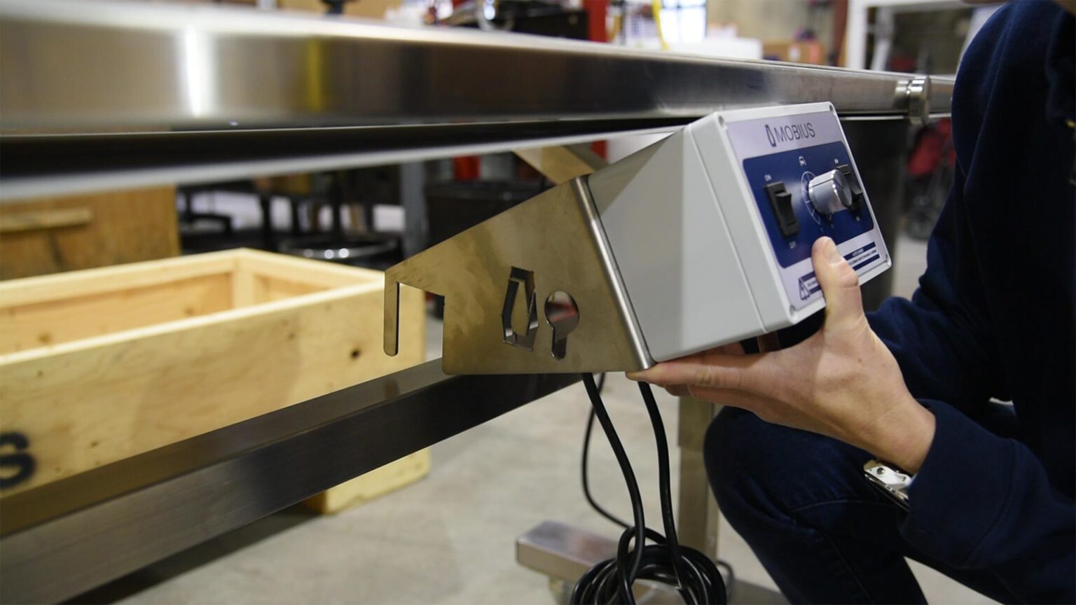 Conveyor Uncrating & Assembly - Mobius Trimmer