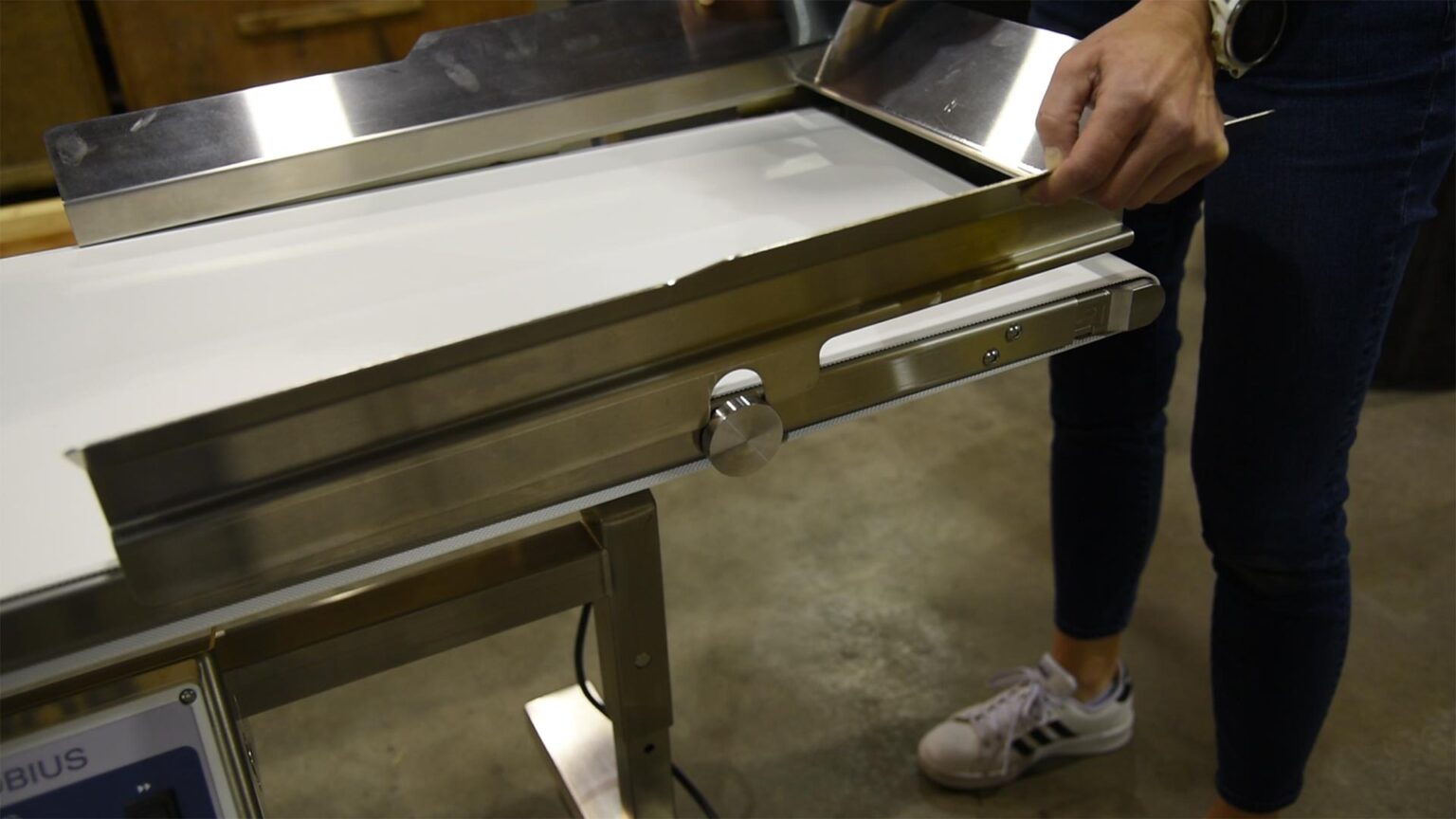 Conveyor Uncrating & Assembly - Mobius Trimmer